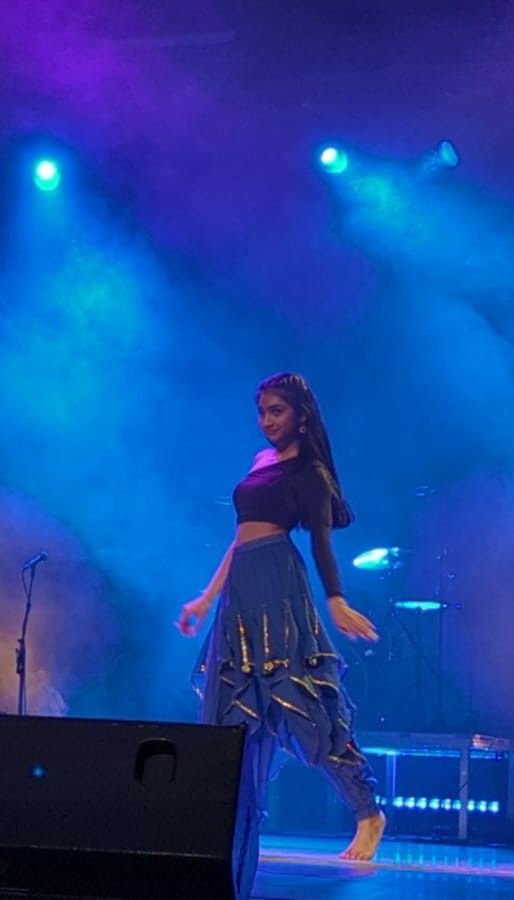Ria Shroff's post on Goodwall - Here are two pictures of me performing on stage. Dancing and ...